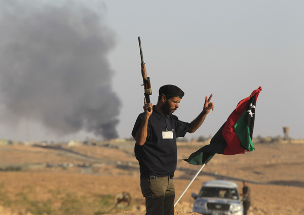 Gaddafi Dead: Buried in Secret Location (VIDEO)